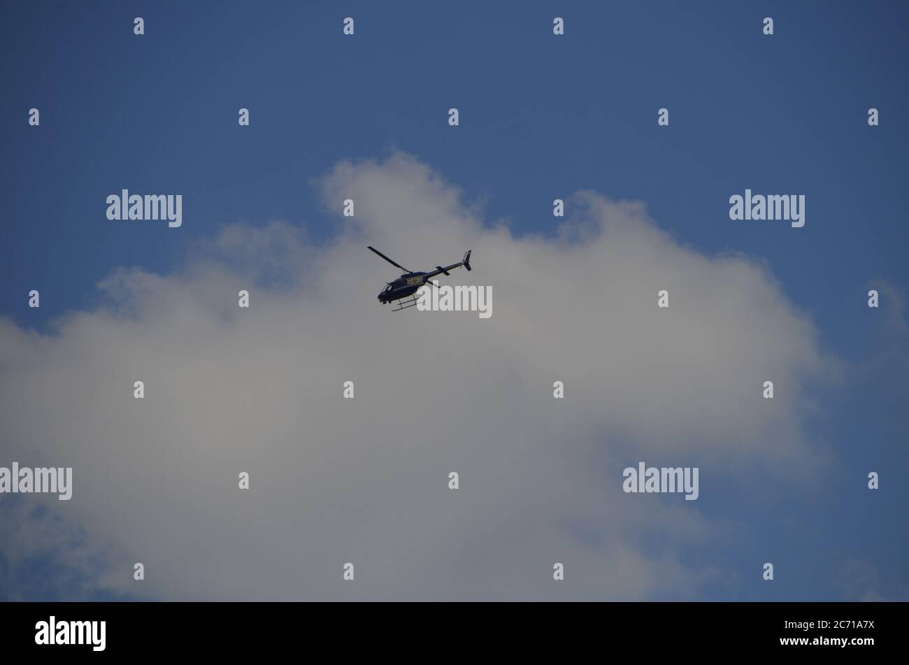 Metro Police Helicopter Frozen in the Sky Stock Photo - Alamy