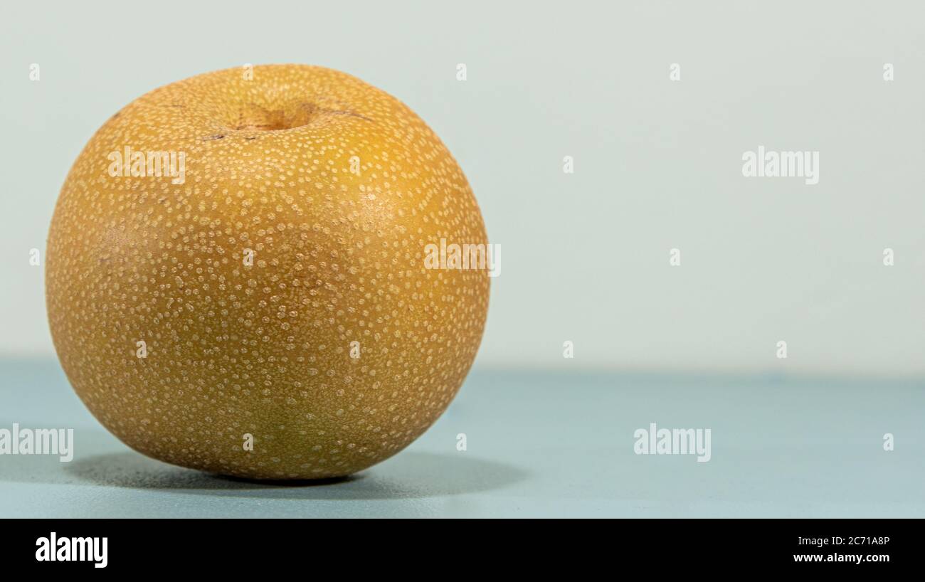 Fresh fruit of pear-nashi, nashi or náxi. Pear of the Asian variety ...