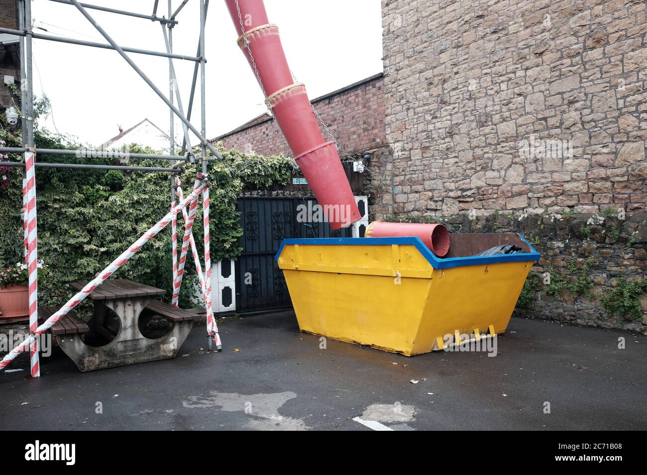 August 2019 - Builders skip with chute used by roofing contractors when ...