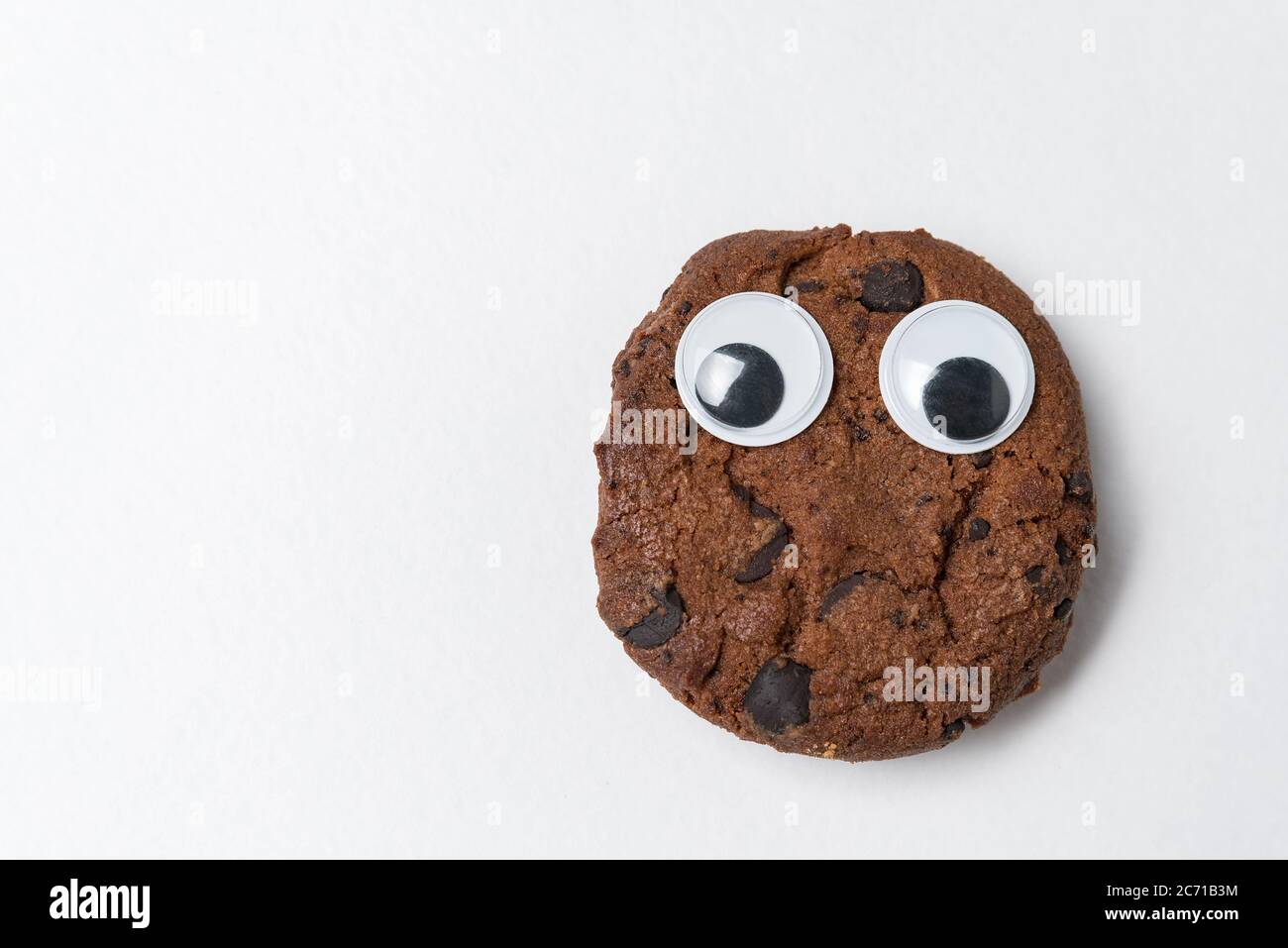 Chocolate chip cookies with Googly eyes on white background. Cookies ...