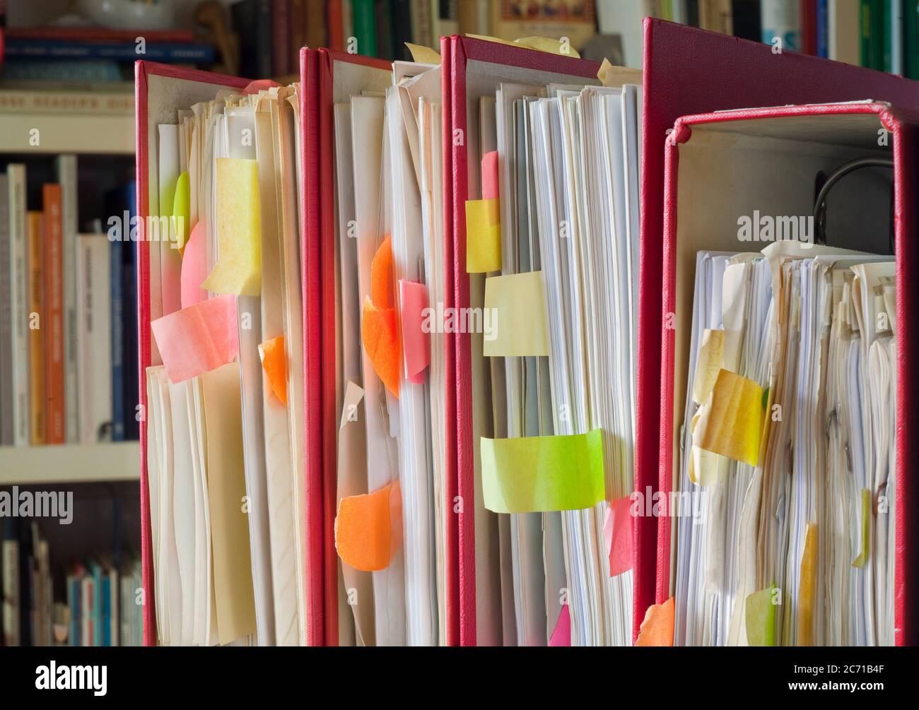 messy file folders and documents, bureaucracy and red tape concept ...