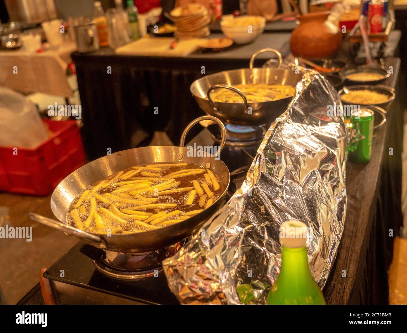 French fries frying in a pan Stock Photo - Alamy