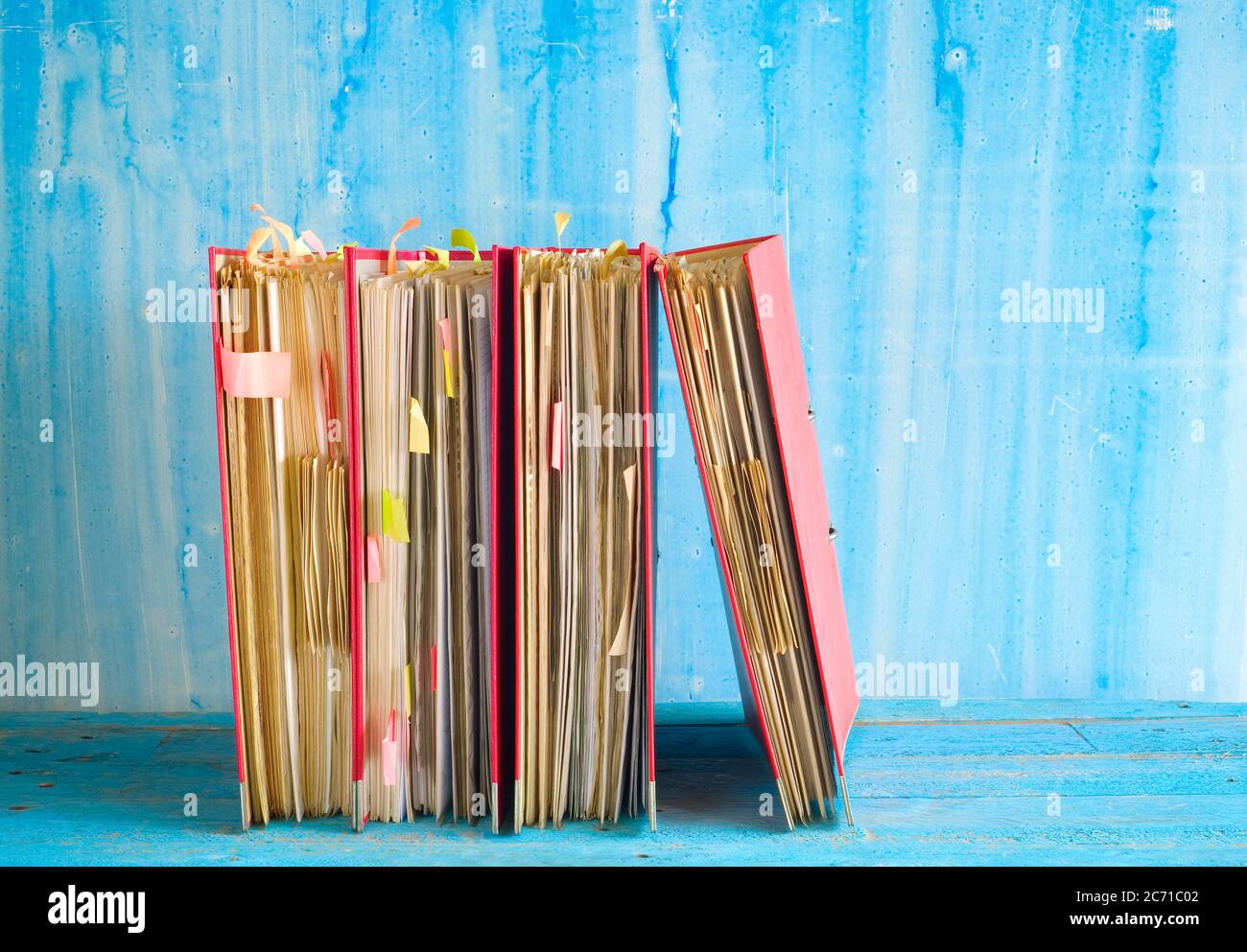 messy file folders and documents, bureaucracy and red tape concept ...