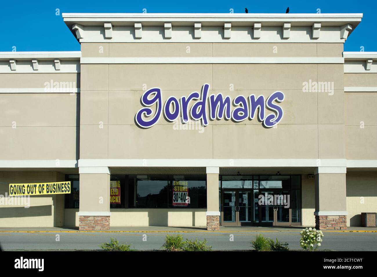 Exterior signs for Gordmans department store including "going out of ...