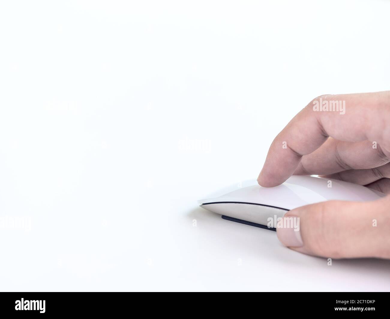 Hand using computer mouse. Finger clicking on white modern mouse ...