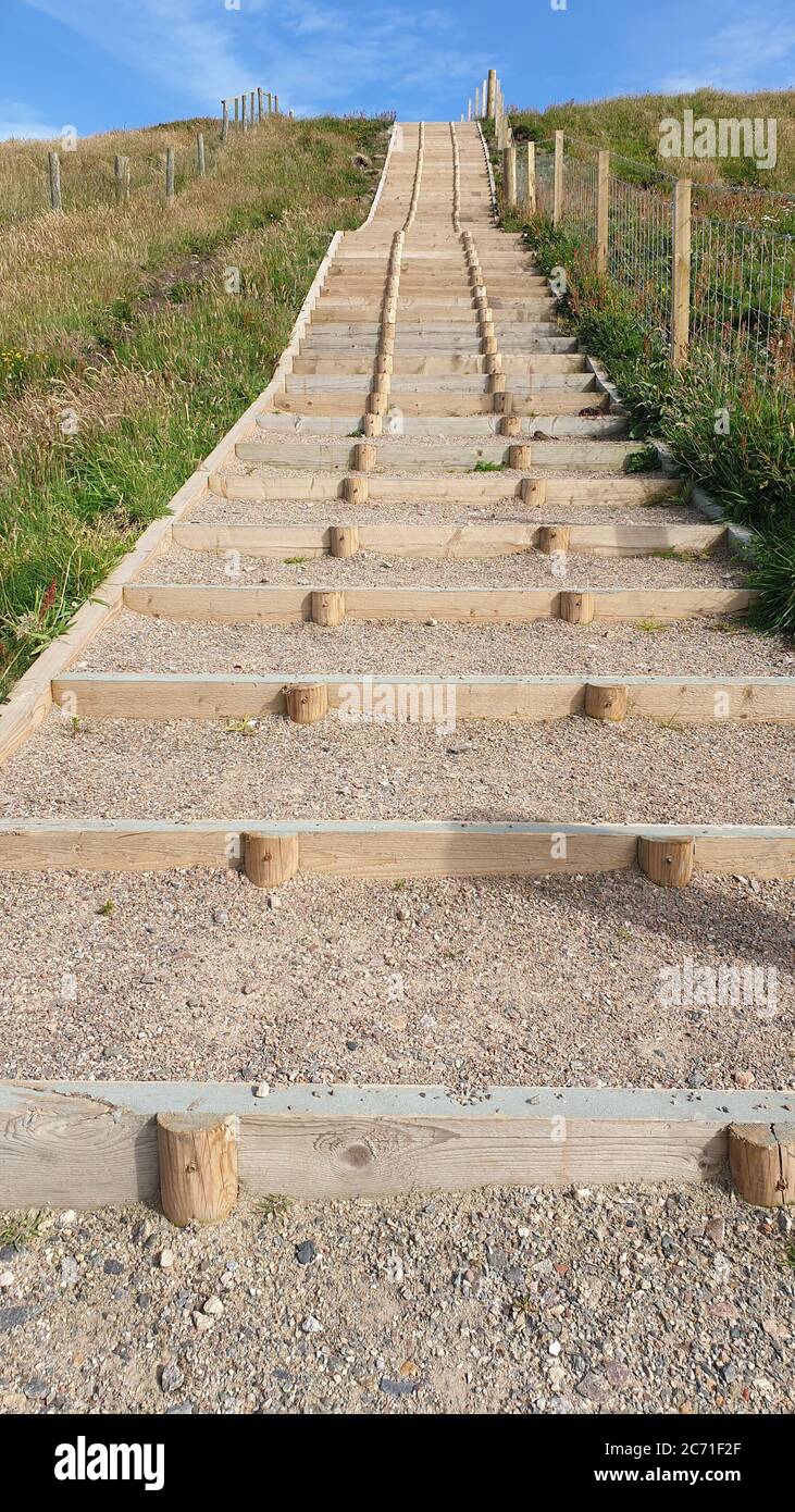 Fence going up hill hi-res stock photography and images - Alamy