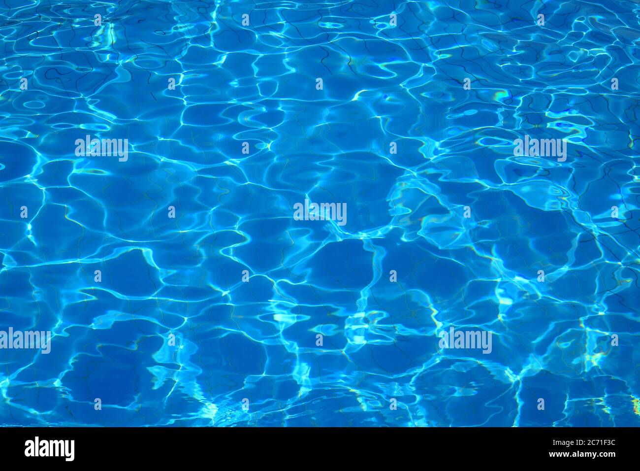 Pure blue water in the pool, pond. Water background for recreation and ...