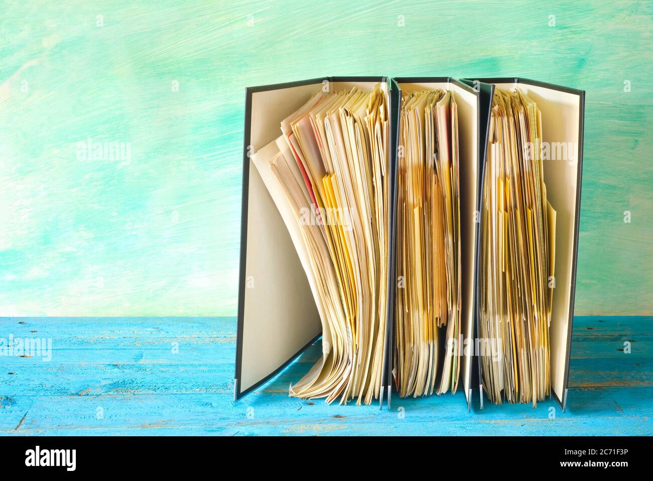 messy file folders and documents, bureaucracy and red tape concept ...