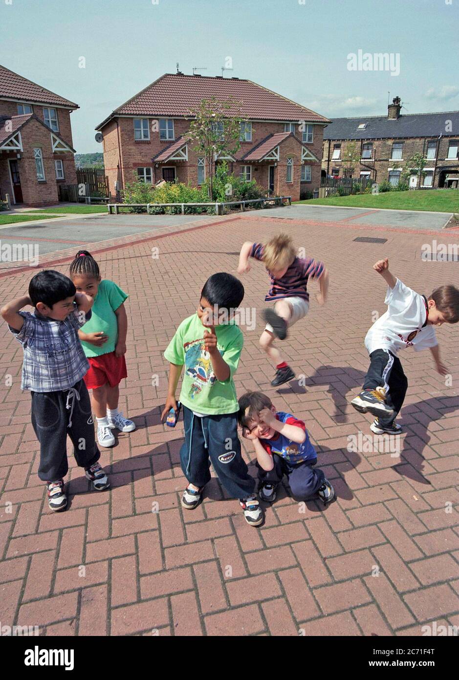 British asian and white children playing together hi-res stock ...