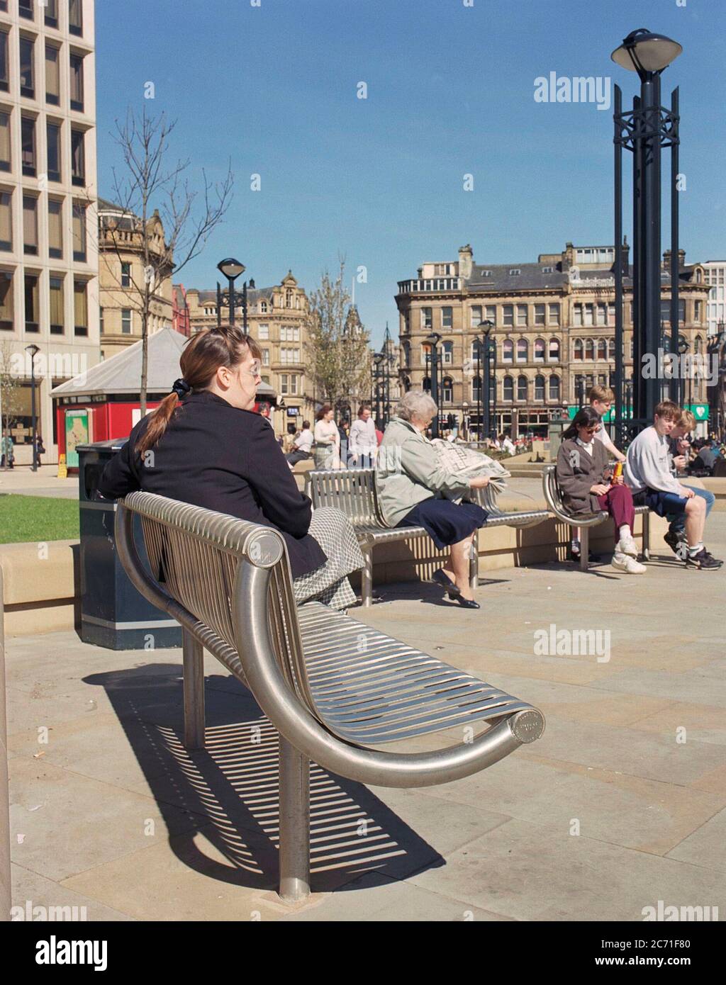 1997, people enjoying the lunchtime sun at Bradford Centenary Square ...