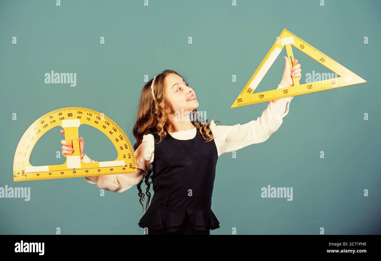 Kid school uniform hold ruler. School education concept. Sizing and ...