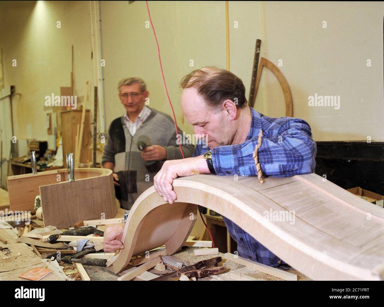 Craftsmen woodworkers at work in UK factory Stock Photo - Alamy