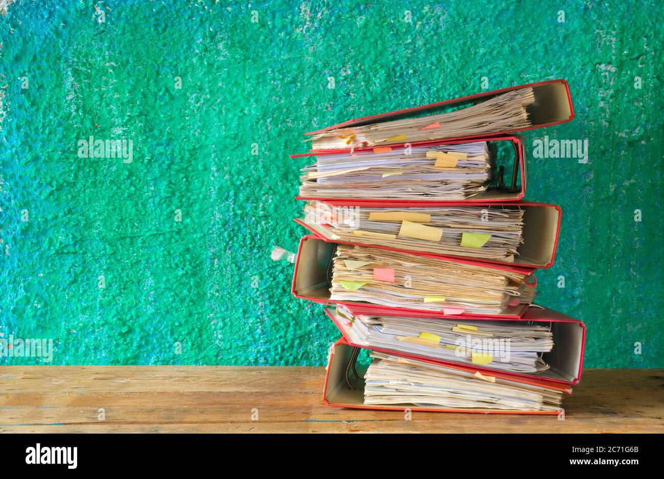messy file folders and documents, bureaucracy and red tape concept ...
