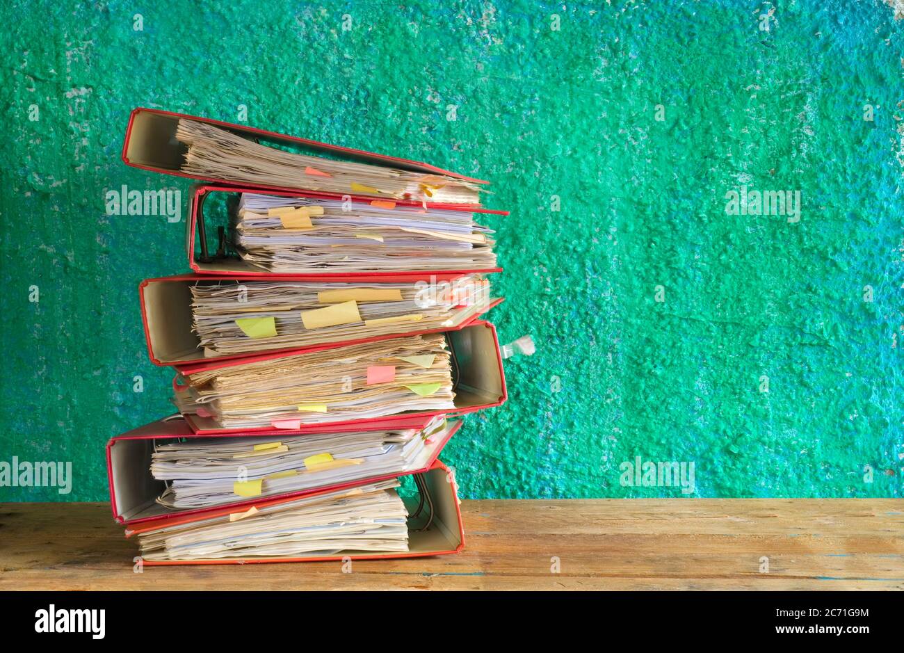 messy file folders and documents, bureaucracy and red tape concept ...
