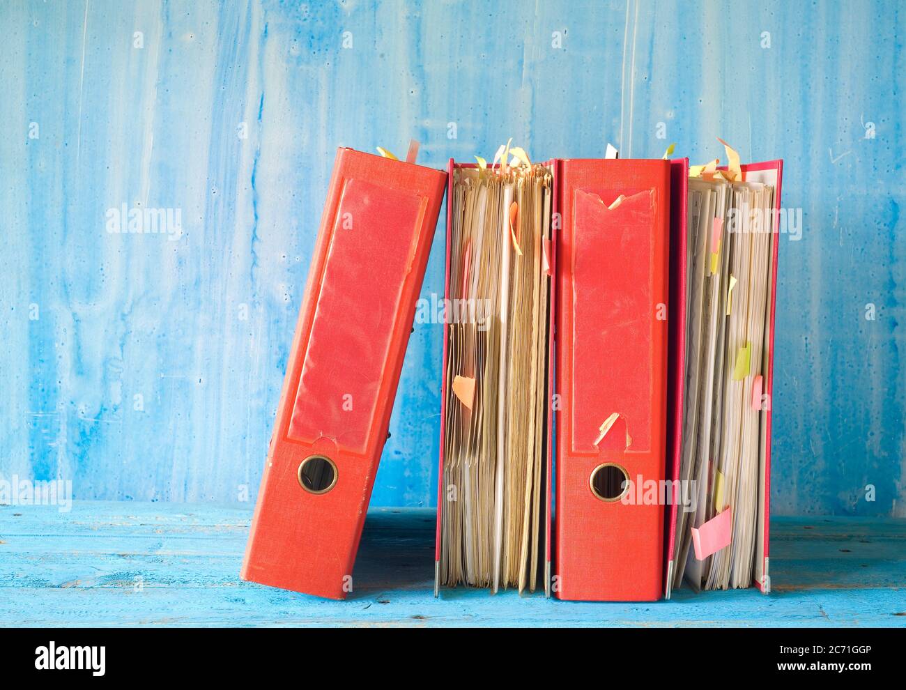 messy file folders and documents, bureaucracy and red tape concept ...