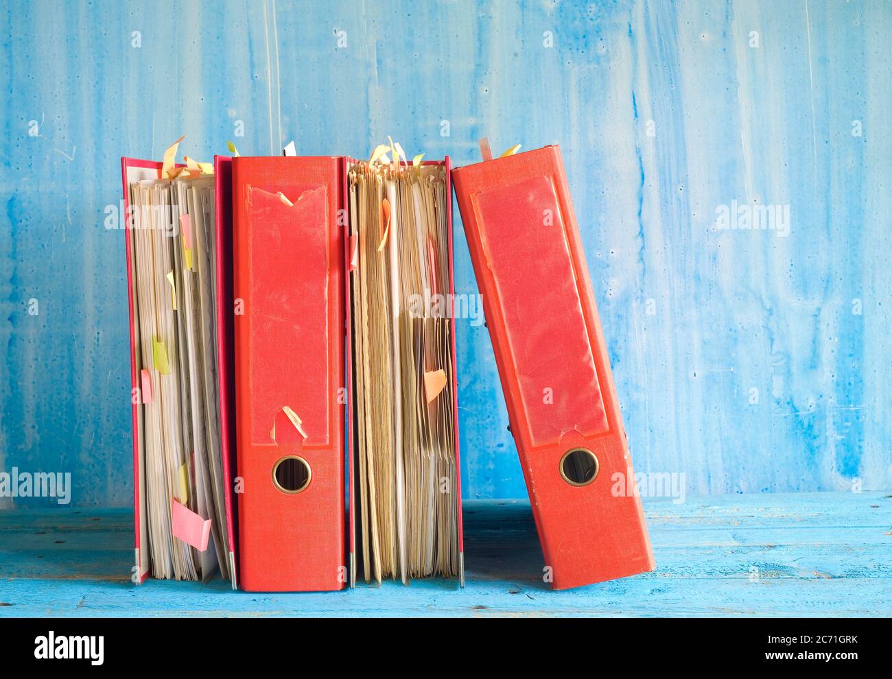 messy file folders and documents, bureaucracy and red tape concept ...