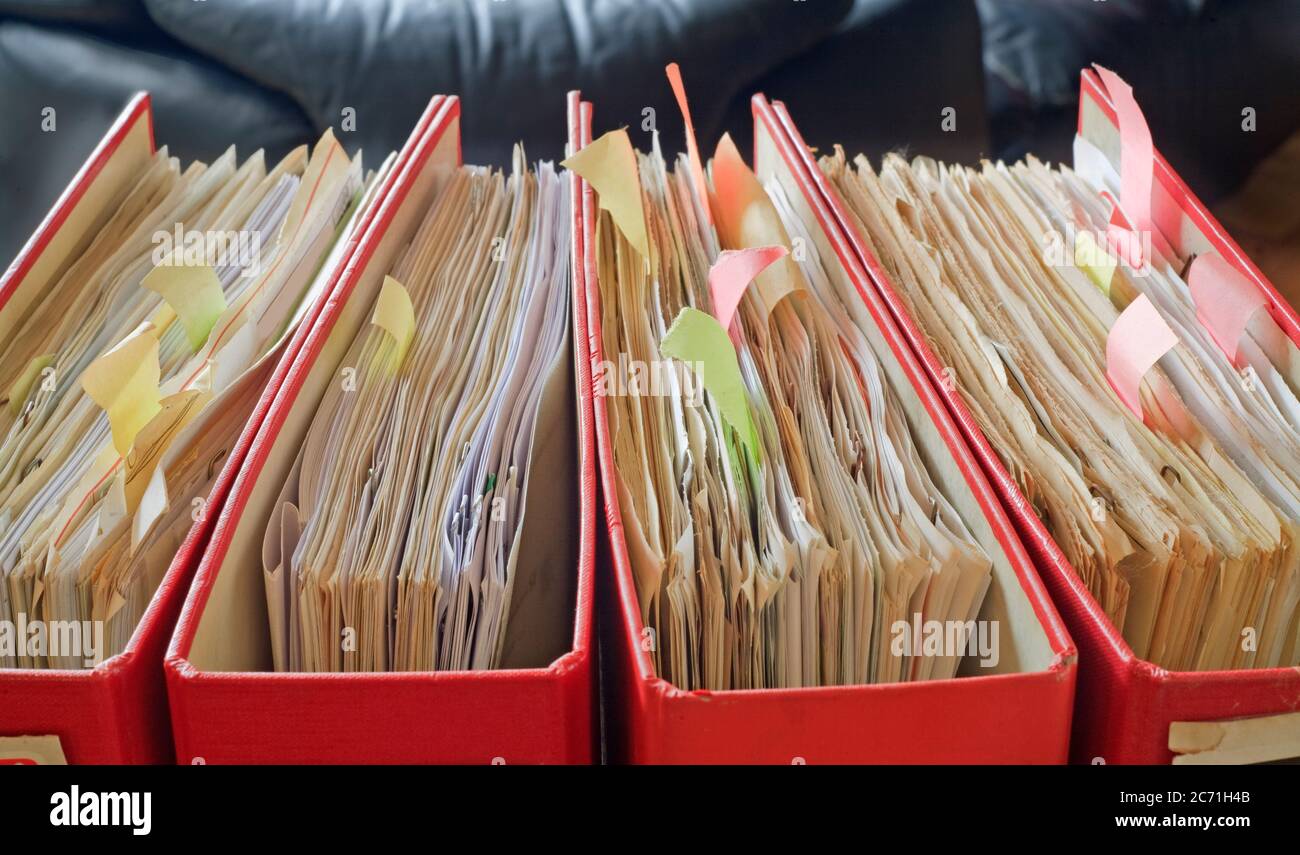 messy file folders and documents, bureaucracy and red tape concept ...