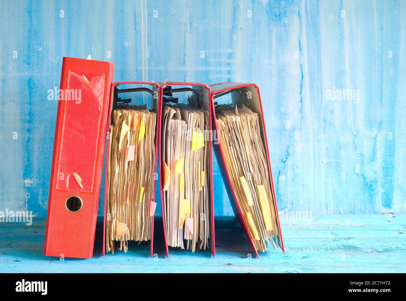 messy file folders and documents, bureaucracy and red tape concept ...