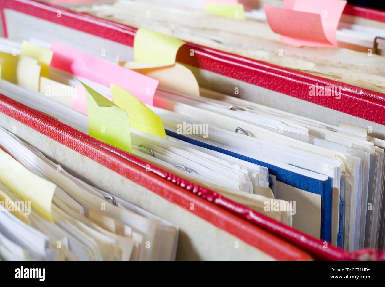 messy file folders and documents, bureaucracy and red tape concept ...