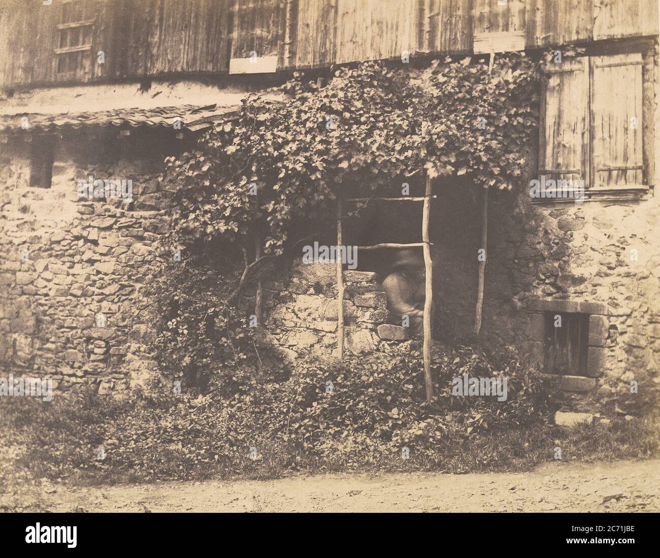 [Rustic Building with Man under Trellis], ca. 1853 Stock Photo - Alamy