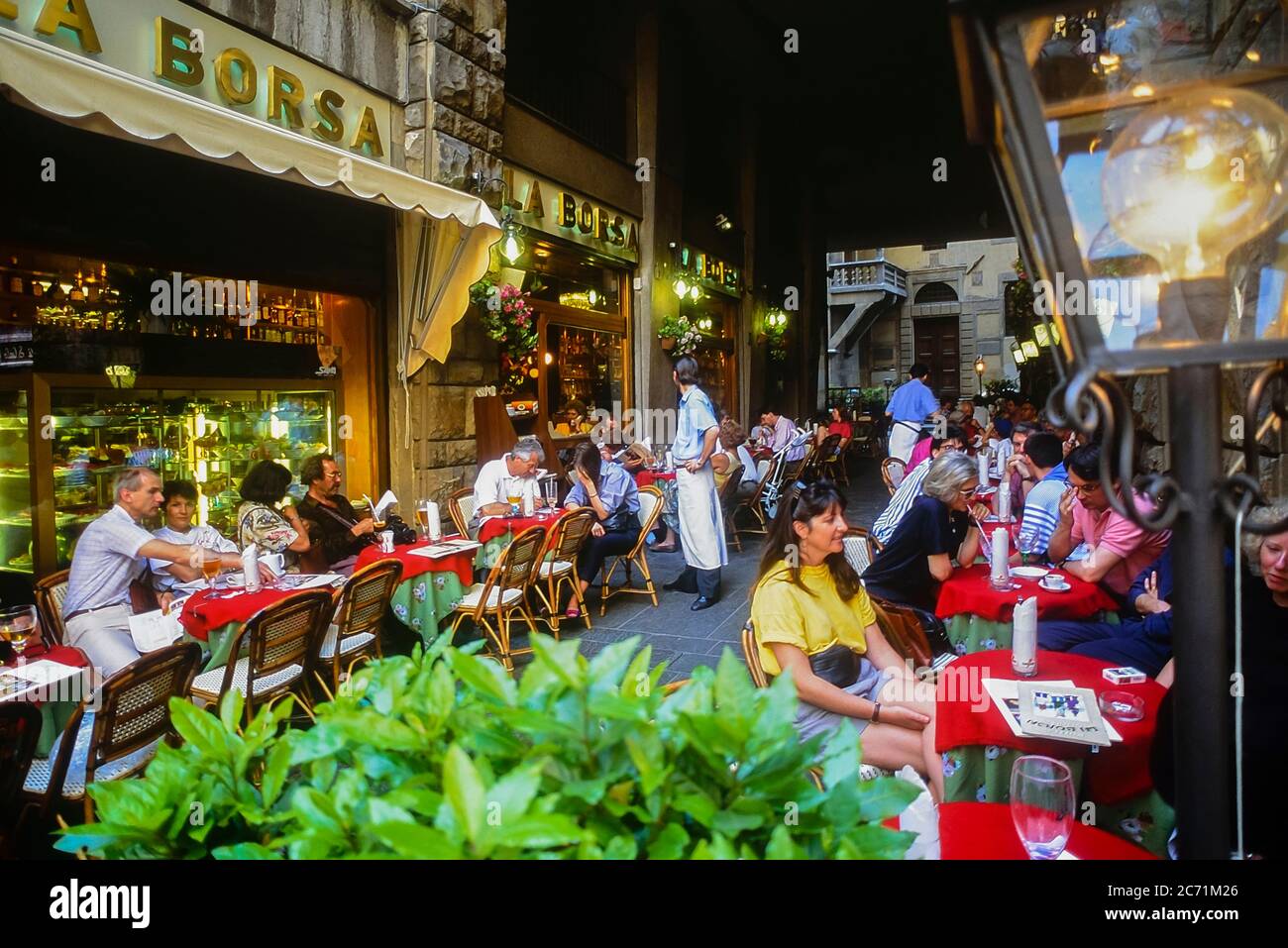 Waiters and customers at La Borsa cafe, restaurant and bar. Florence ...