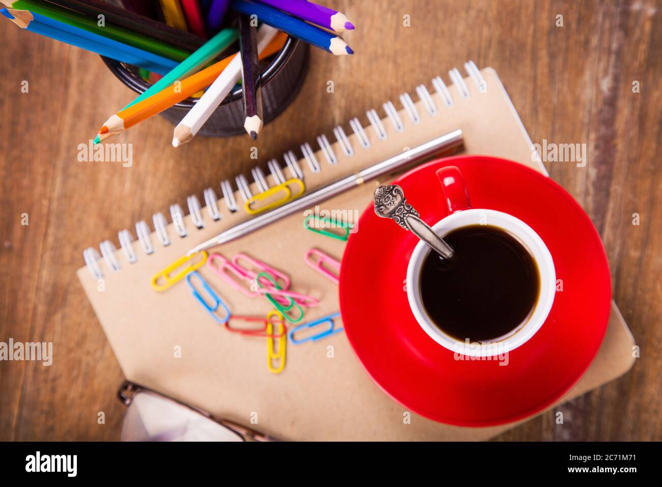 red cup fool of coffee with notebook on wooden background Stock Photo ...