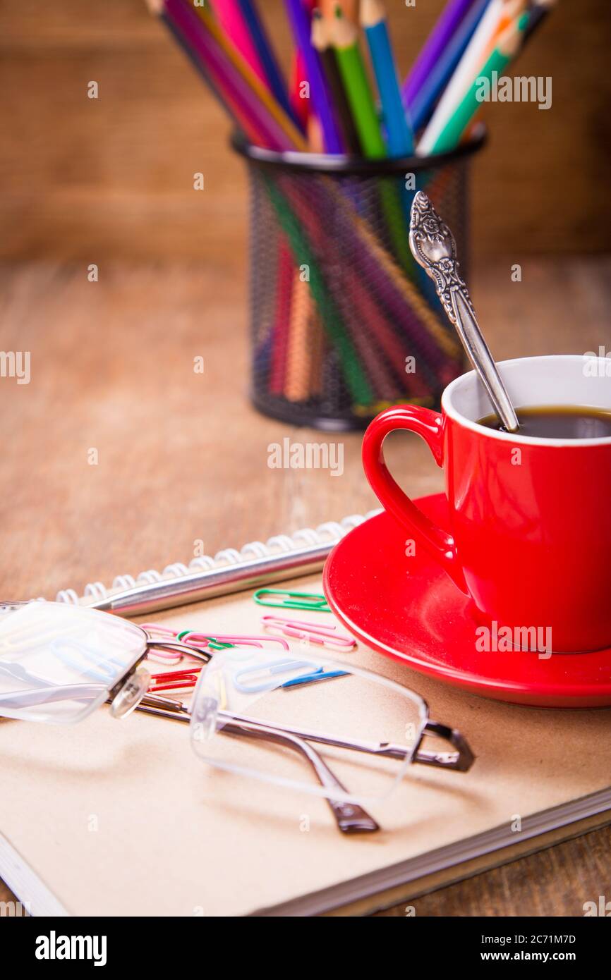 red cup fool of coffee with notebook on wooden background Stock Photo ...