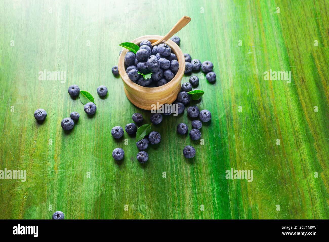 Blueberries on green table hi-res stock photography and images - Alamy