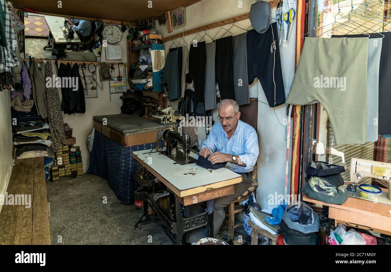 Adiyaman, Turkey - July 2018: Tailor working on traditional handycrafts ...