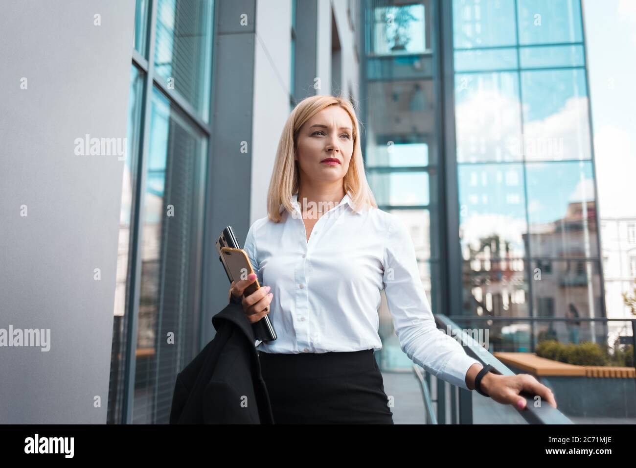One successful business woman walk hi-res stock photography and images ...