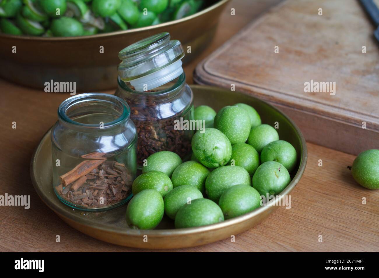 Step-by-step recipe for preparing Italian liquor nocino from green ...
