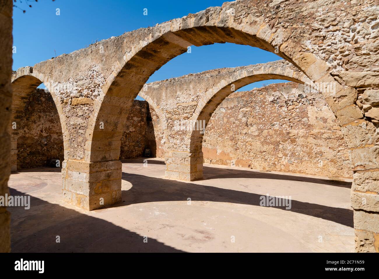 Old Greek stone arches in Crete, Greece Stock Photo - Alamy