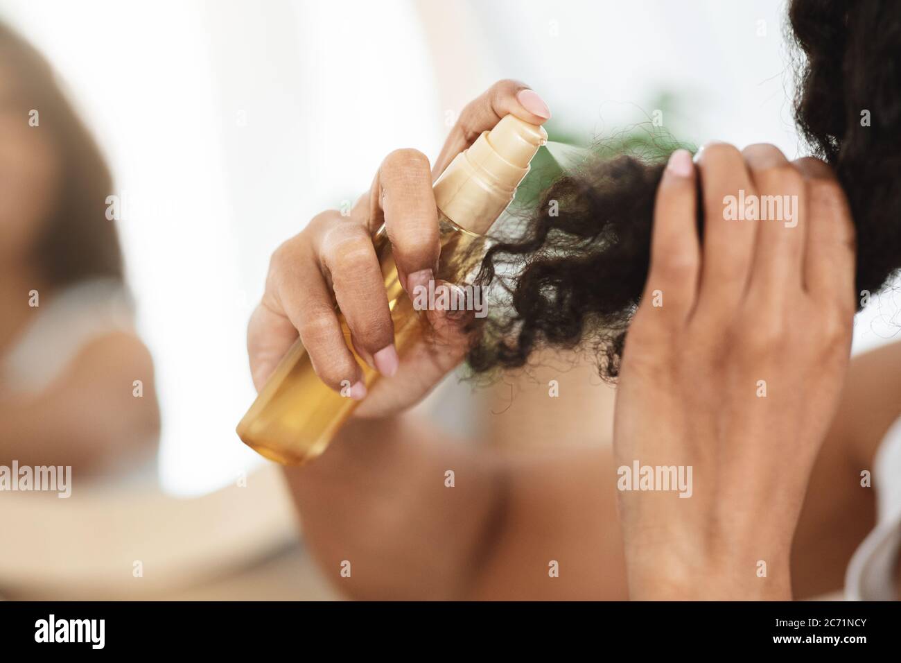 Split Ends Remedy. Unrecognizable Black Woman Applying Moisturising ...