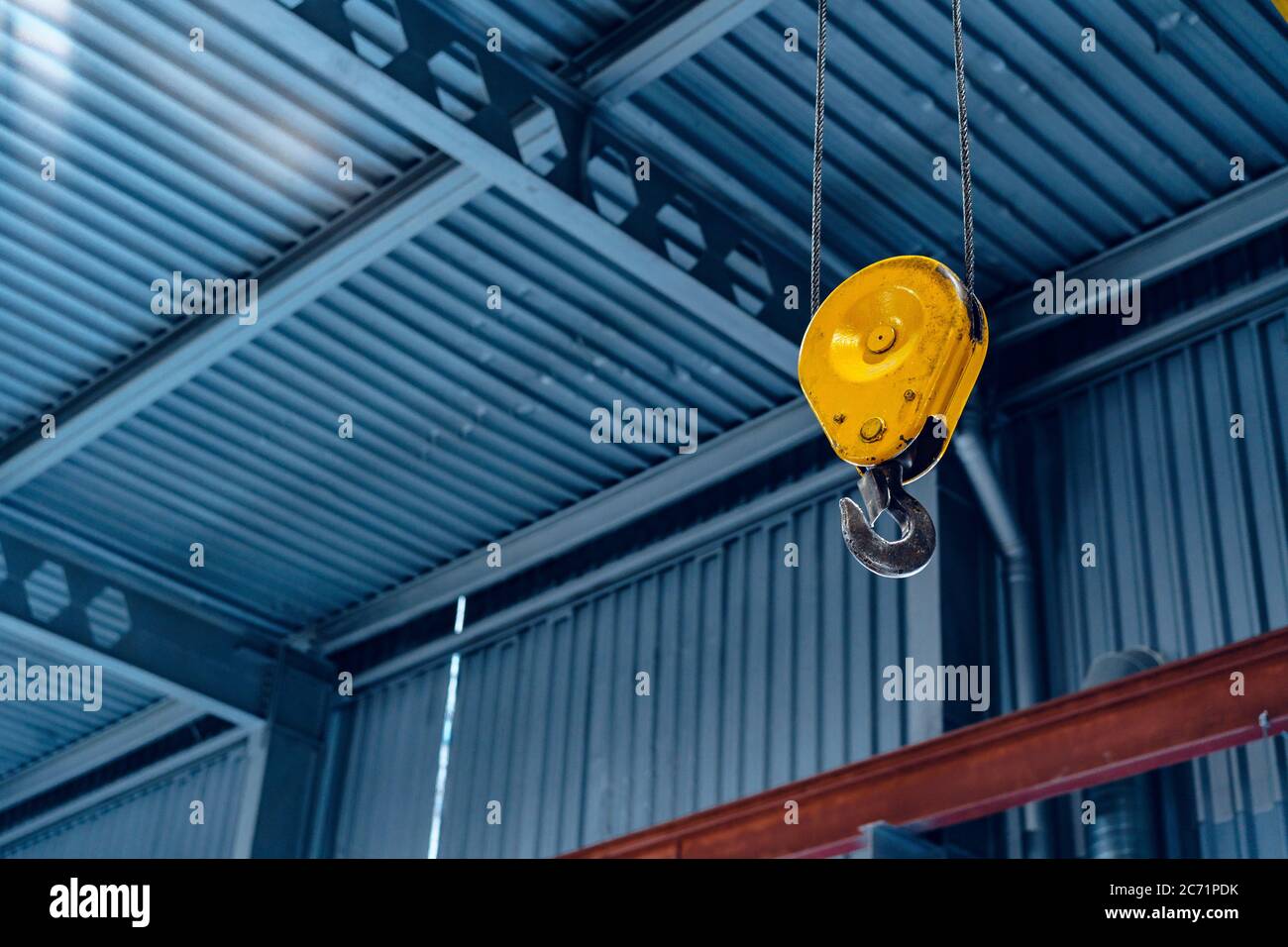 Industrial crane hook in a modern factory building Stock Photo - Alamy