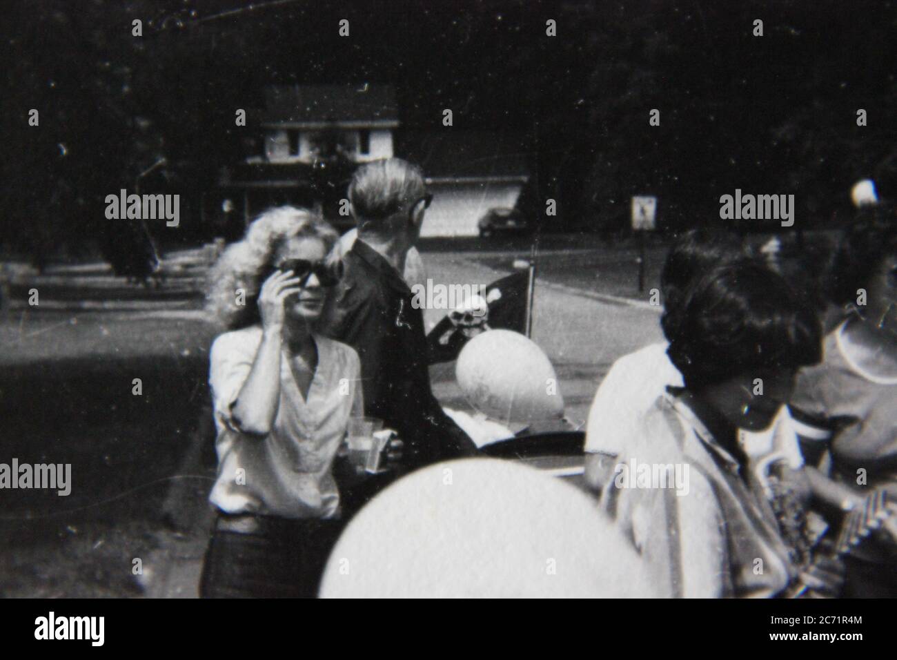 Fine 70s vintage black and white lifestyle photography of a friendly ...