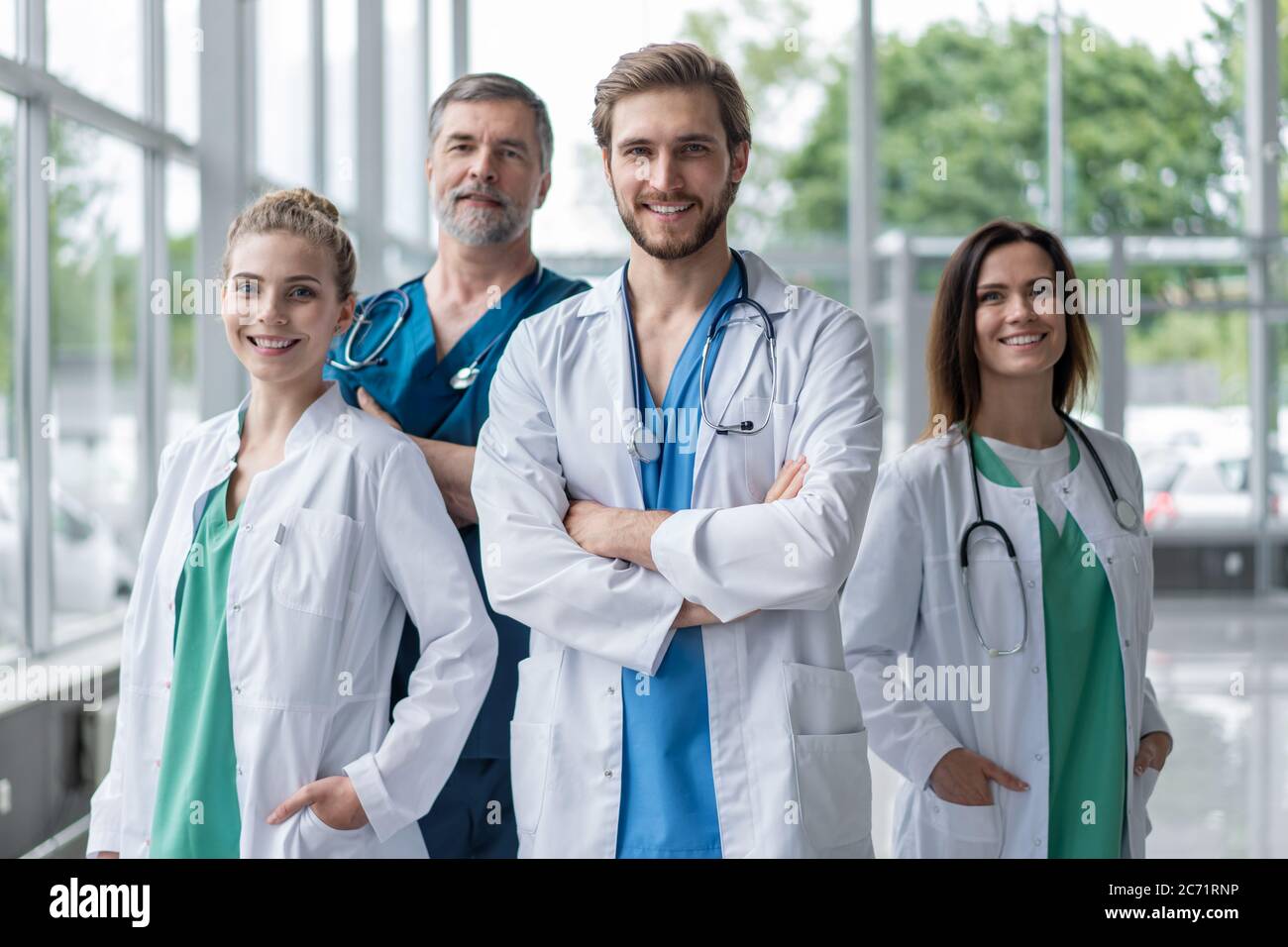 Group of medical staff smiling at the hospital Stock Photo - Alamy