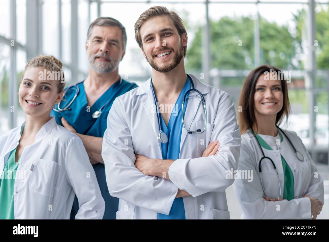 Group of medical staff smiling at the hospital Stock Photo - Alamy