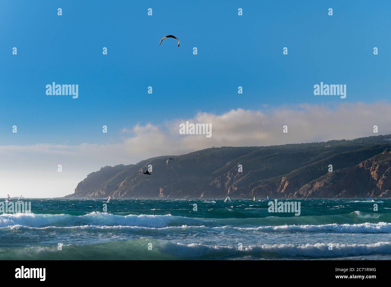Praia do Guincho, Portugal - July 4, 2020: Kite and windsurfers at the Guincho Beach (Praia do ...