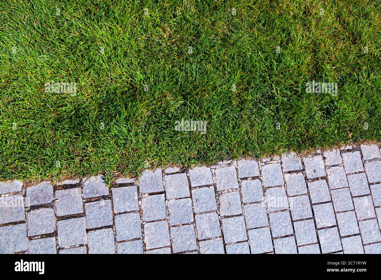 Stone walkway and green lawn in the park. Summer background Stock Photo ...