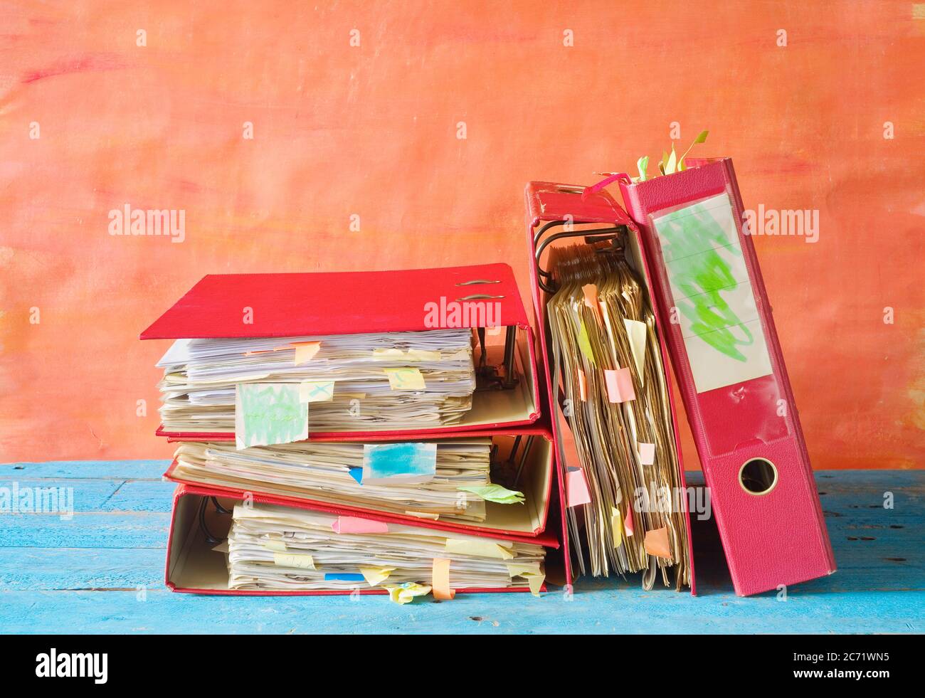 messy file folders and documents, bureaucracy and red tape concept ...