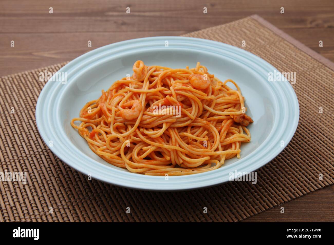 spaghetti pescatore italian food on plate isolated on table Stock Photo ...