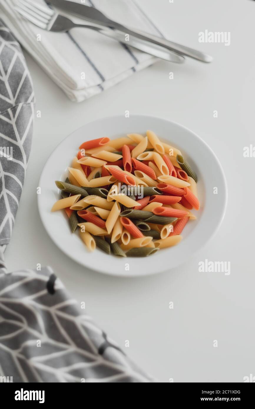 Plate of pasta on coloured plate hi-res stock photography and images ...