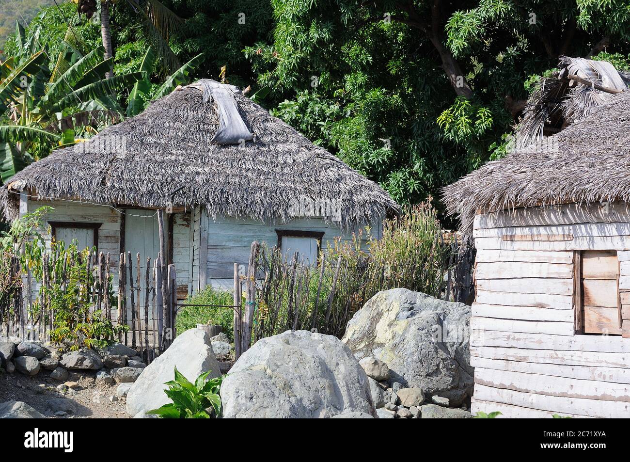 Thatched roof building at the base of the Mountain in the Village, in ...