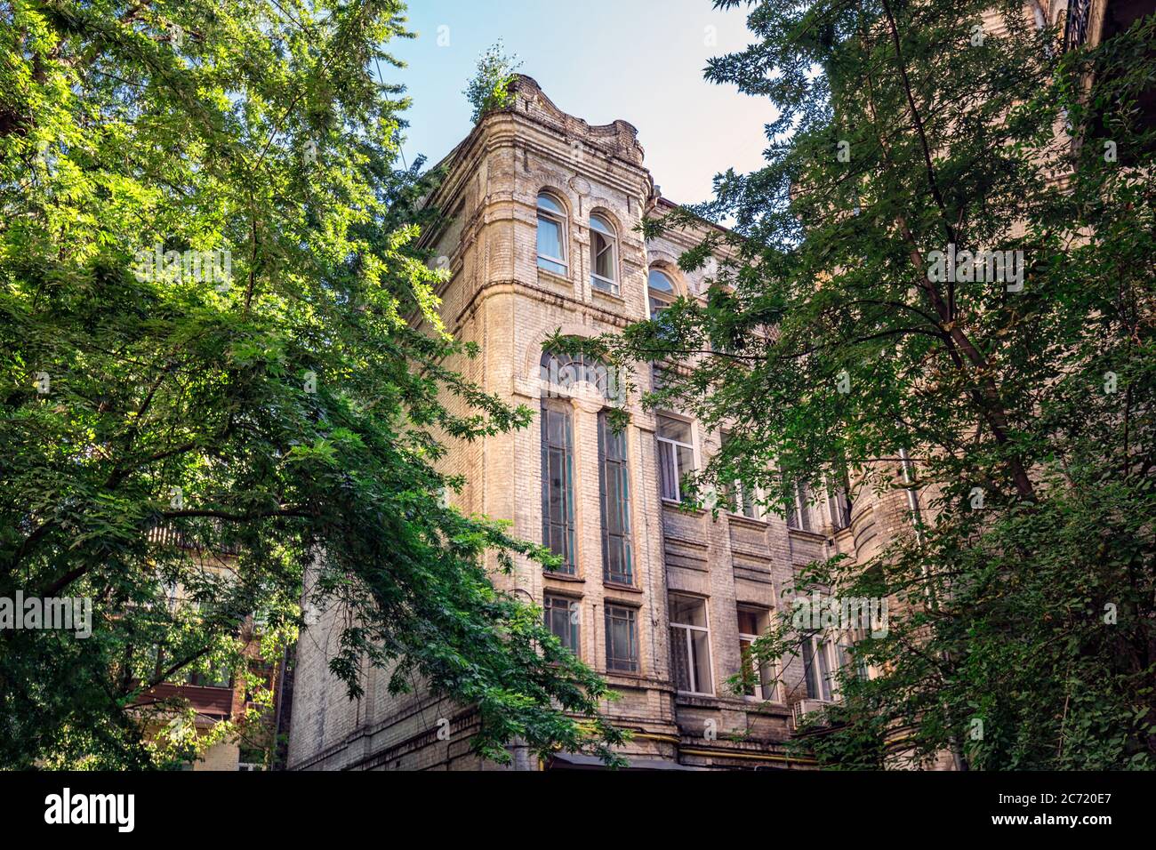 Antique brick house with green trees at Kiev, Ukraine Stock Photo - Alamy
