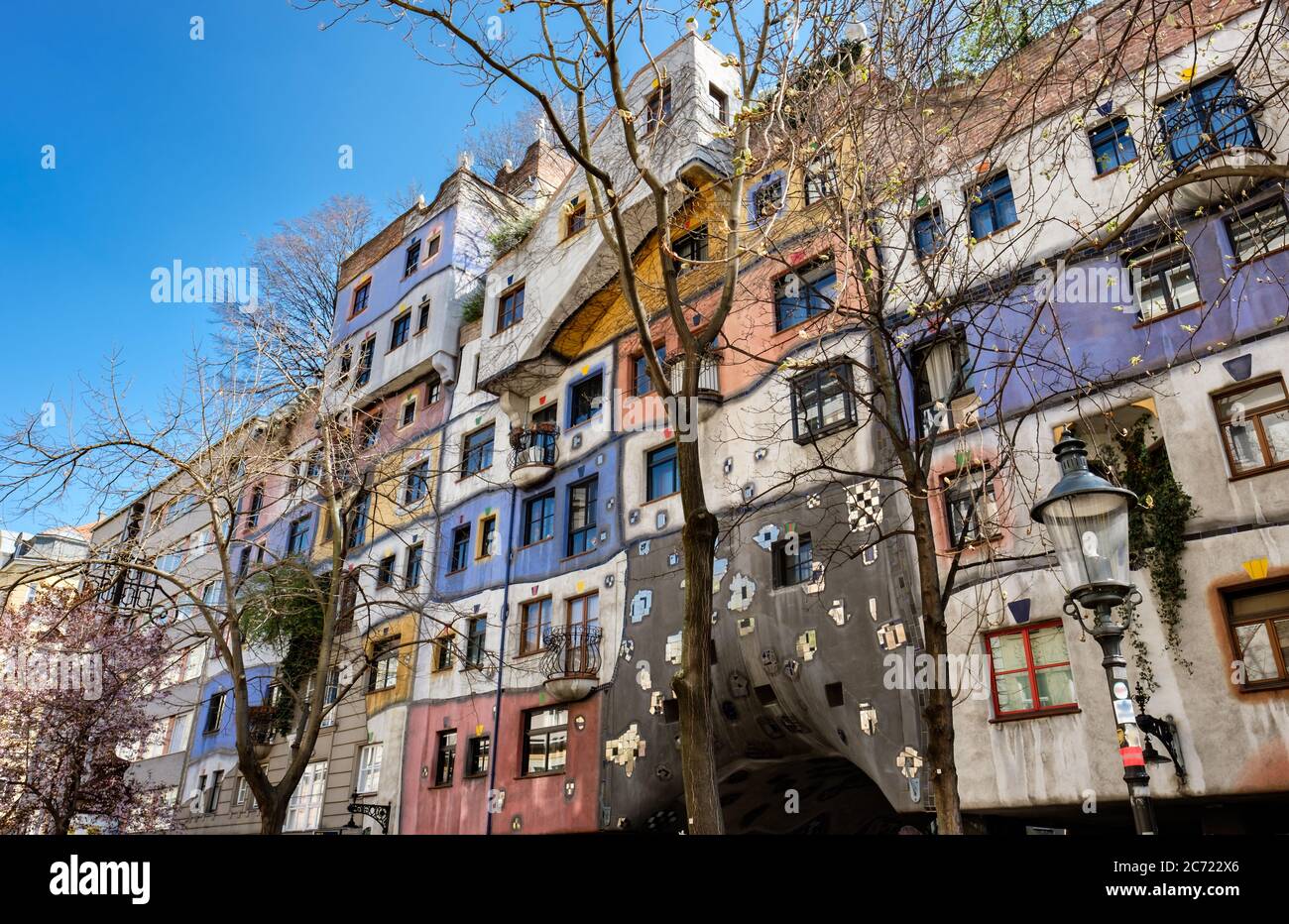 The famous "Hundertwasser" house, colorful sections, windows and ...