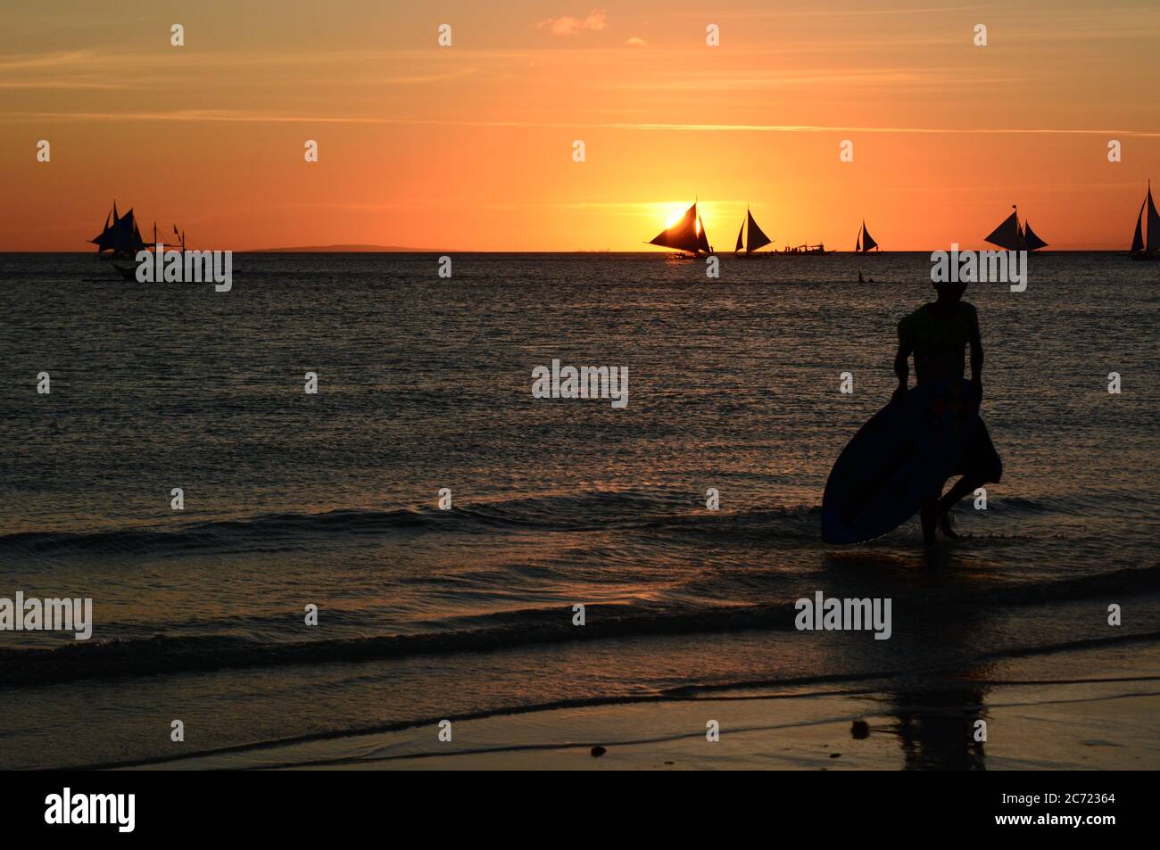 Sunset silhouettes. White Beach. Boracay. Aklan. Western Visayas ...