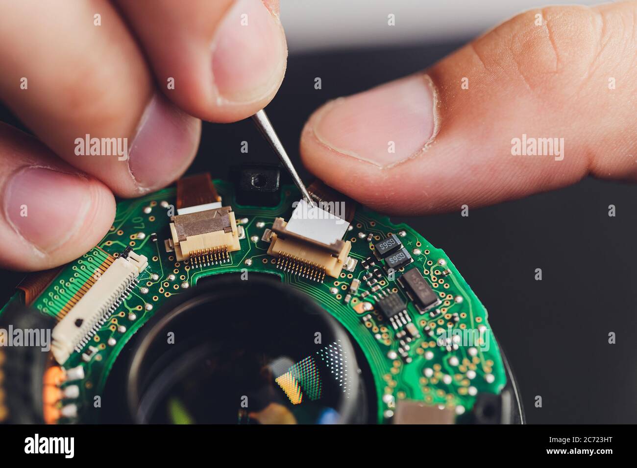 Big professional digital camera lens dissassembly process.Demounted ...