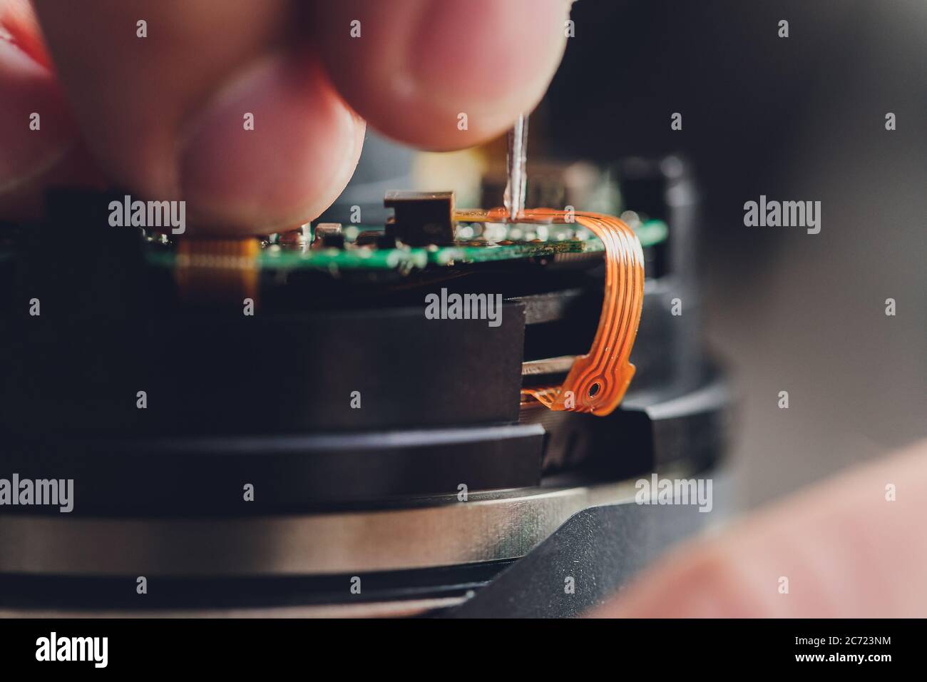 Big professional digital camera lens dissassembly process.Demounted ...