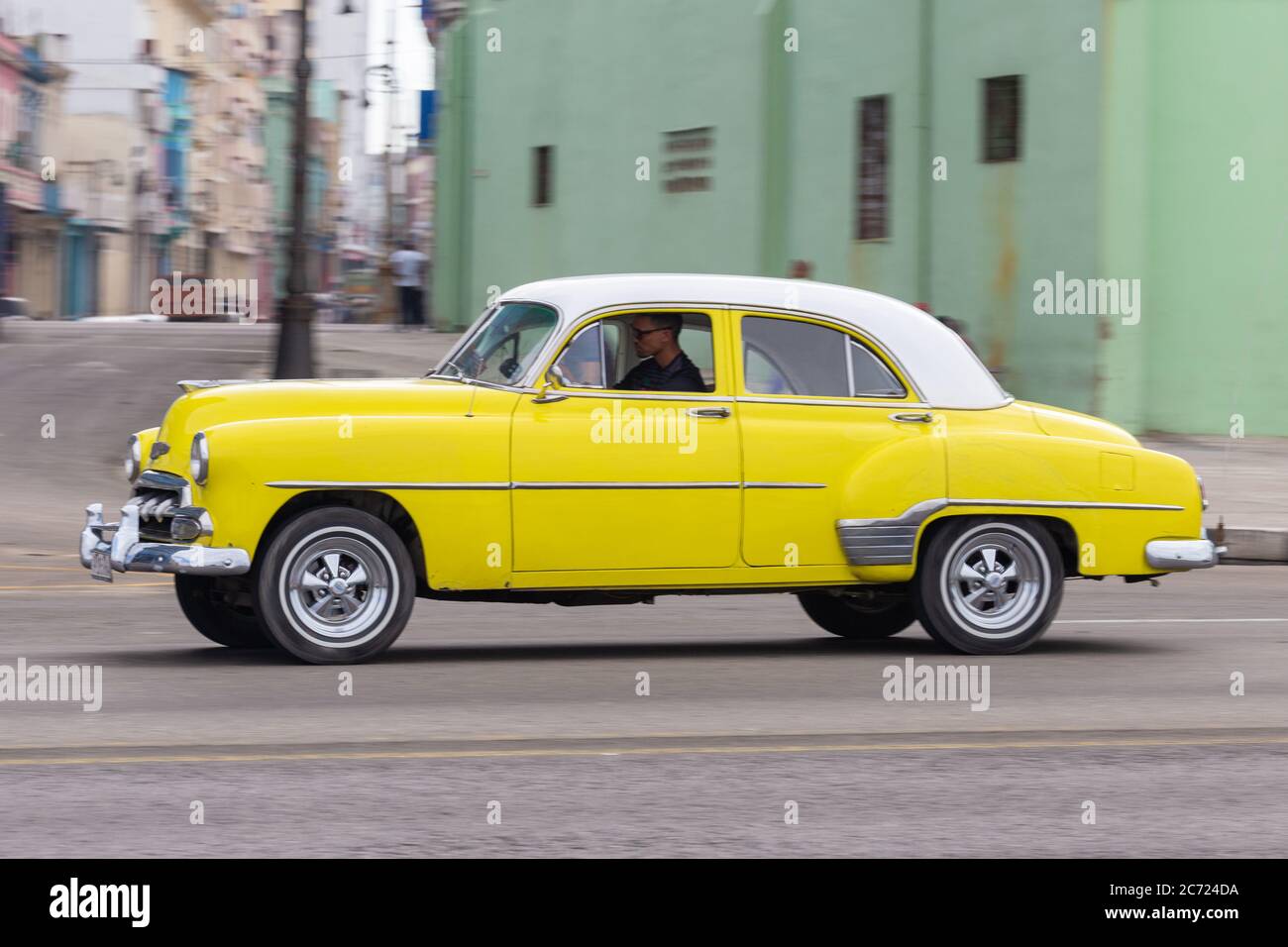 Cuba 10/12/2019 colourful old yellow car used as taxi or transportation ...