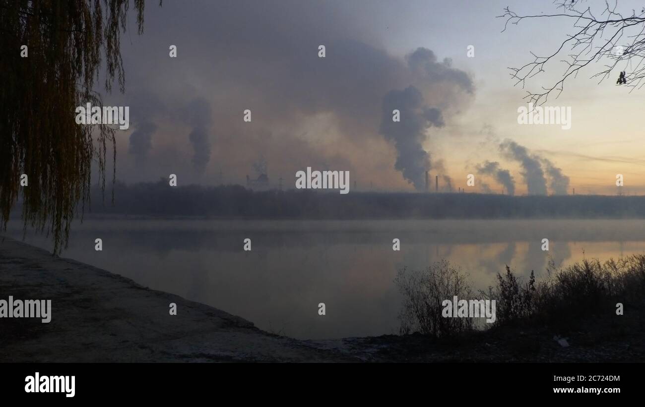 Gas, steam and smoke. Industrial chimneys time lapse. Metallurgical ...